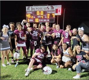 The Eufaula senior athletes and football trainers celebrate defeating ...