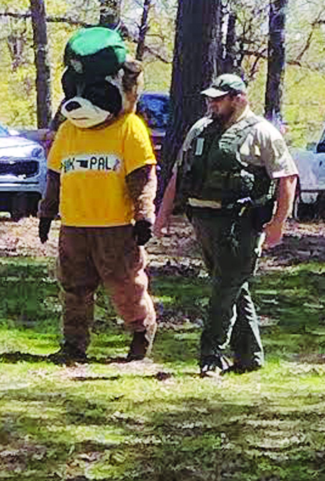 A park ranger escorted Park Pal - Eufaula Indian Journal